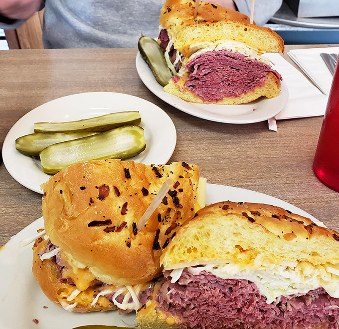 Two sandwiches, one mission: to prove that between two slices of bread lies the answer to most of life's problems. The pickle is just a bonus.