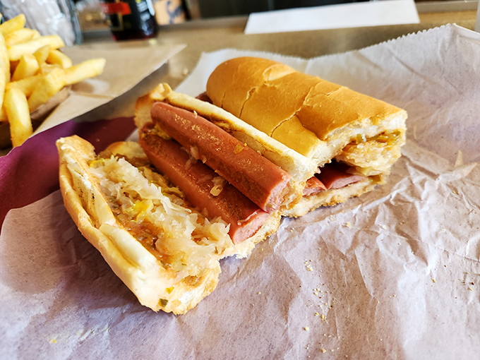 The hot dog with sauerkraut offers that perfect tangy counterpoint to the savory dog. It's like a tiny German festival in your mouth. 