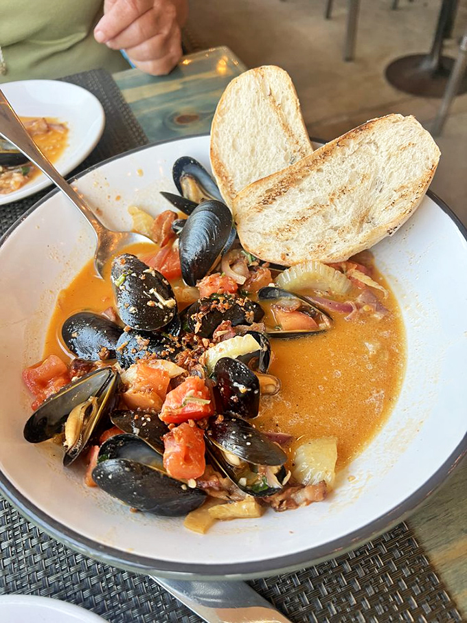 These mussels aren't just swimming in broth&mdash;they're luxuriating in a flavor hot tub that demands to be sopped up with every available bread surface.