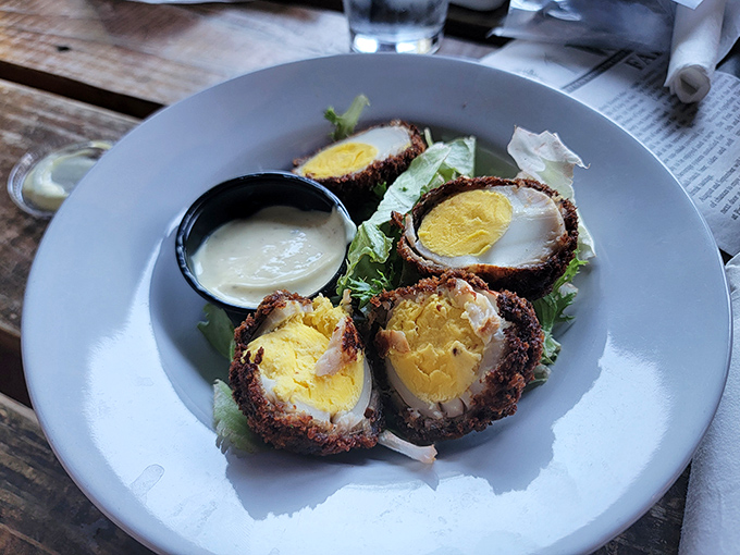 Scotch eggs: where breakfast meets snack time in a crispy-coated package. Protein perfection that pairs beautifully with a pint.