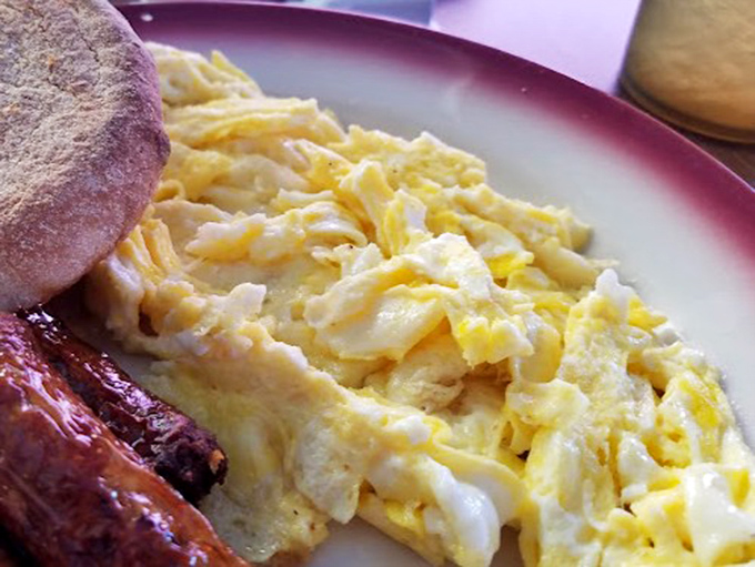 These scrambled eggs achieve that mythical texture between fluffy and substantial, paired with bacon that's practically applying for landmark status.