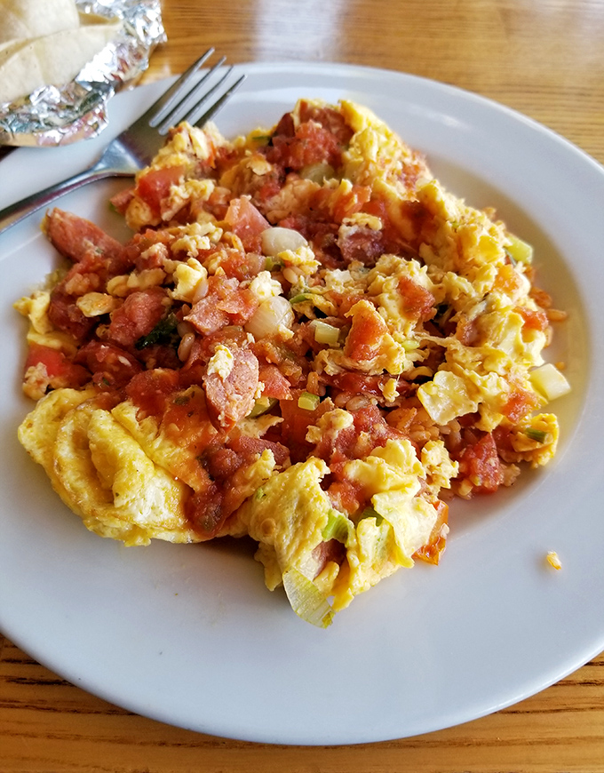 Scrambled eggs with enough bacon to make even Ron Swanson nod in solemn approval.
