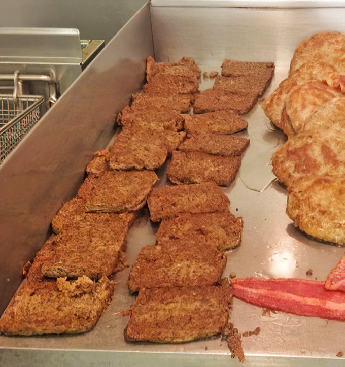 Scrapple: the breakfast meat that dares you to ask what's in it. Golden-fried slabs waiting to convert the uninitiated into true Delawareans.