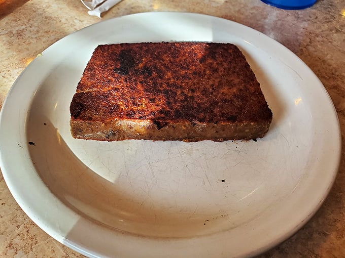 Scrapple: Pennsylvania's culinary dare that transforms into a crispy, savory revelation for those brave enough to order it.