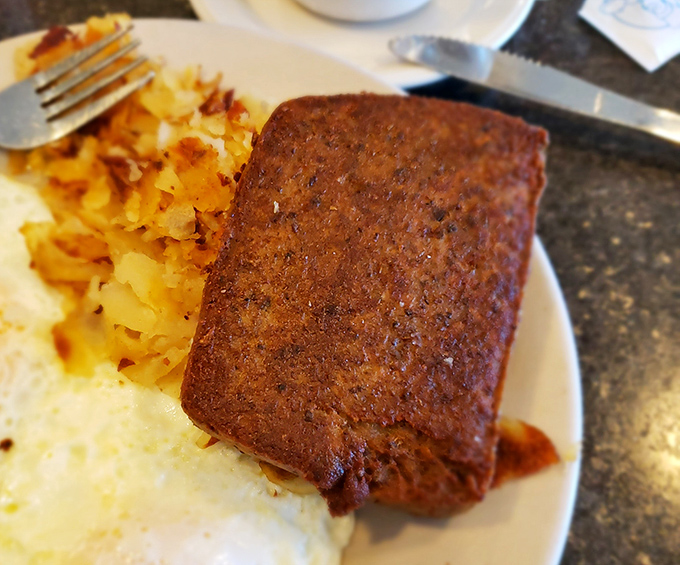 Scrapple: Pennsylvania's breakfast of champions that divides families but unites taste buds. Crispy outside, tender inside&mdash;just as nature intended.