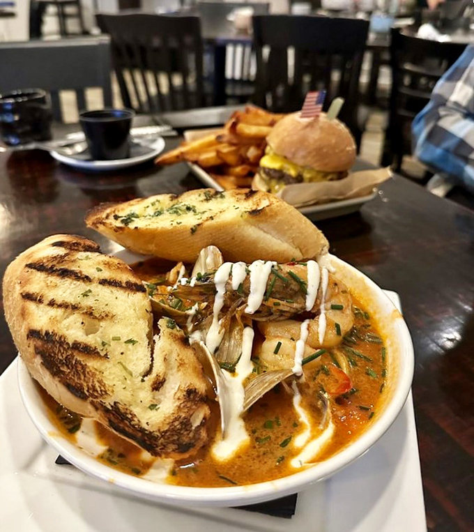 This isn't just soup&mdash;it's a seafood symphony in a bowl, where crusty bread plays backup to the star crustacean.