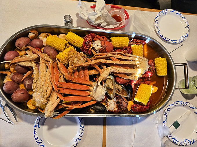 The seafood motherlode&mdash;crab legs, corn, potatoes, and more&mdash;arranged like Neptune's personal feast. Bring reinforcements or prepare for delicious leftovers.