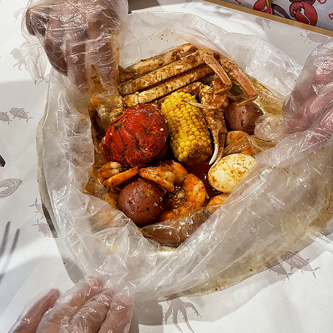 The seafood boil arrives like a treasure chest&mdash;crab legs, corn, potatoes, and shrimp mingling in spiced harmony. Plastic gloves required, dignity optional.