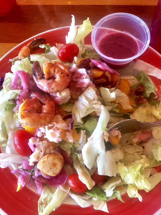 A seafood salad that makes eating greens feel like cheating. Those pink pickled onions add the perfect zing to complement the perfectly seasoned shrimp.