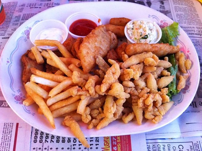 The seafood platter that launched a thousand return trips &ndash; crispy, golden treasures from the deep atop a bed of fries.
