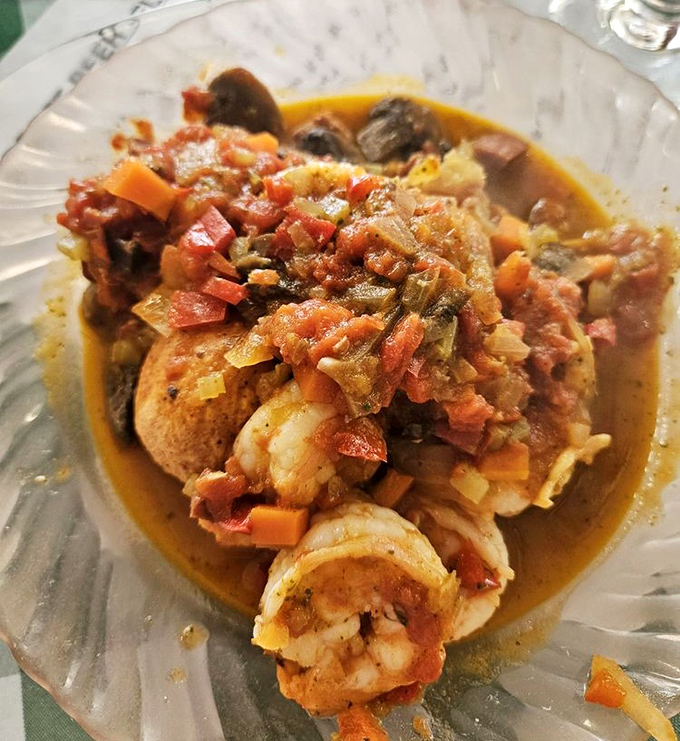 Gulf shrimp swimming in a tomato bath atop creamy grits&mdash;Florida's answer to Italy's claim on comfort food supremacy.