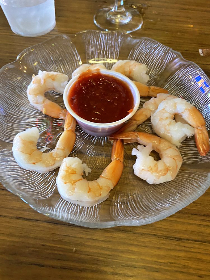 These plump shrimp arranged around cocktail sauce aren't just appetizers—they're the opening act for the seafood concert to come.