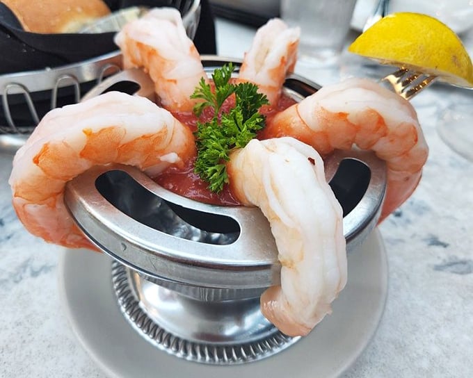 Shrimp cocktail that makes you wonder why anyone bothers with tiny shrimp. These giants hang off the glass like they're showing off.