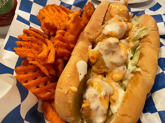 The shrimp po'boy with sweet potato fries &ndash; where New Orleans tradition meets Baltimore's seafood obsession in perfect harmony.
