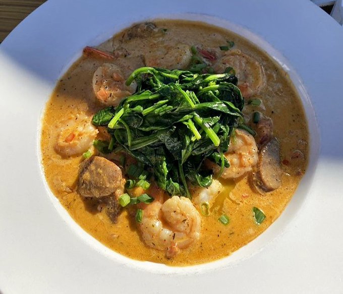 Shrimp and grits with a creamy broth and fresh greens &ndash; Southern comfort meets Chesapeake Bay bounty in one soul-satisfying bowl.