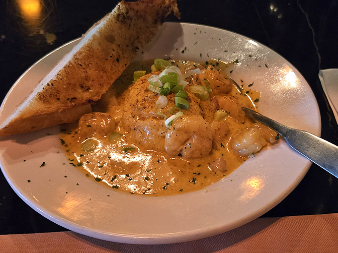 Shrimp swimming in a velvety sauce that whispers of Lowcountry tradition. This dish doesn't just feed you; it tells you a story about South Carolina's culinary heritage.