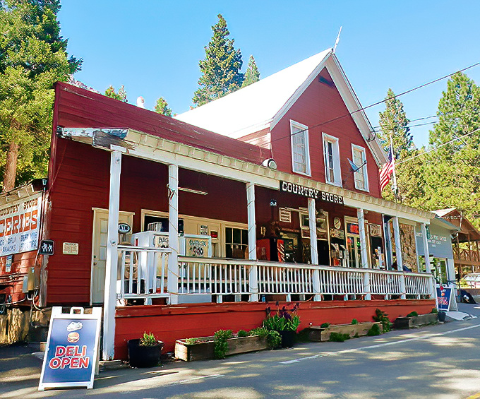 The Sierra Country Store isn't just a shop – it's the town's living room, gossip central, and gourmet deli all wrapped in charming red clapboard.