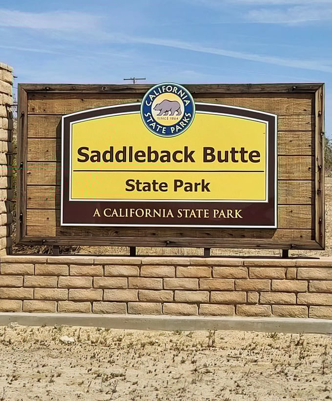 The official welcome sign&mdash;where the Mojave Desert rolls out its sandy carpet and invites you to explore its rugged charms.