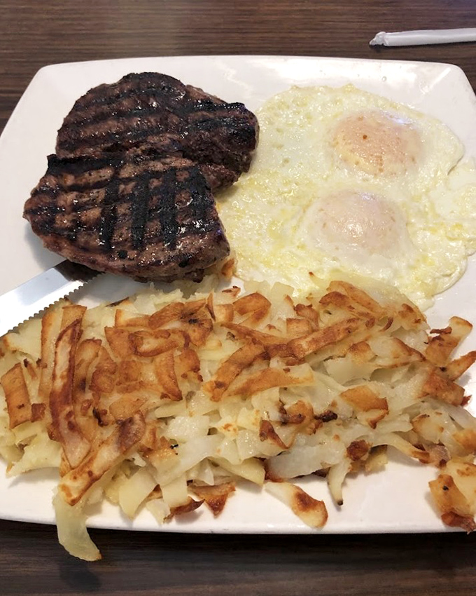 Sometimes you need steak for breakfast. Cowgirls Cafe understands this fundamental truth, serving it alongside sunny-side-up eggs and crispy hash browns.