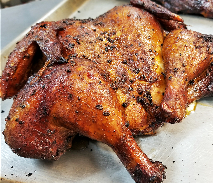 This smoked chicken wears its spice rub like a well-tailored suit &ndash; perfectly fitted to enhance every bite with a complex, smoky character.