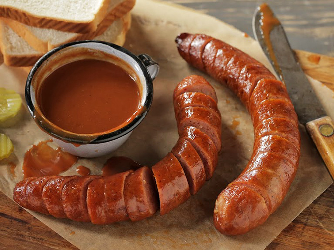 Sausages with that satisfying snap that says "real smokehouse." Sliced and ready for dipping in their signature sauce, these links are BBQ's unsung heroes.