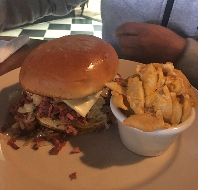 The corned beef sandwich that launched a thousand food pilgrimages, with mac and cheese that refuses to be just a sidekick.