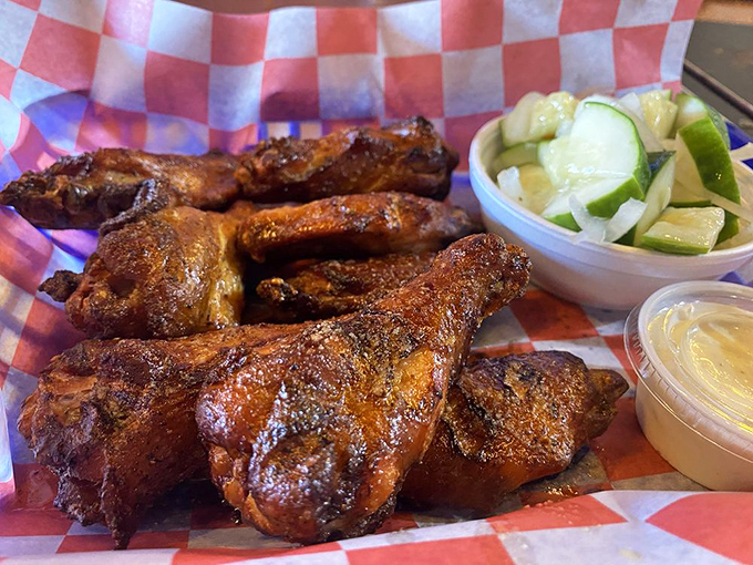 These wings aren't flying anywhere except straight to your happy place, accompanied by cooling cucumber salad and house sauce.