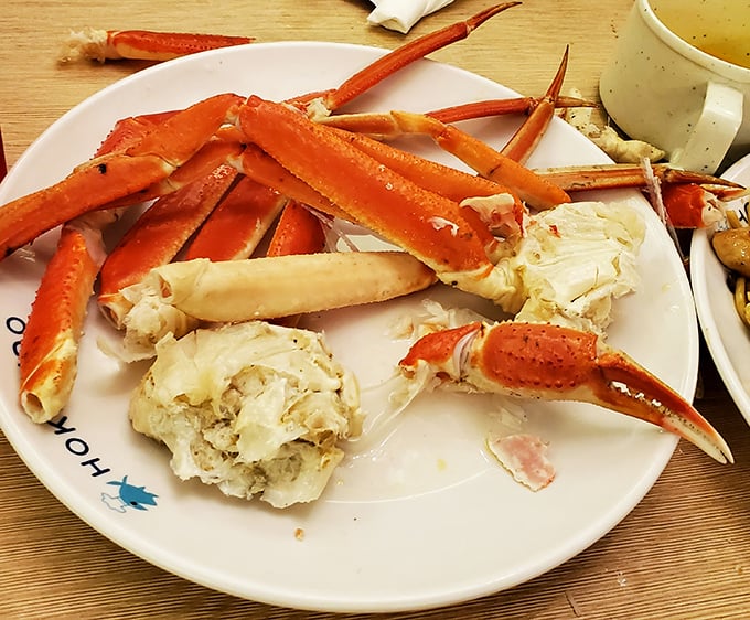 The crown jewel of any seafood buffet &ndash; snow crab legs arranged like nature's perfect puzzle, waiting to reveal their sweet treasure.