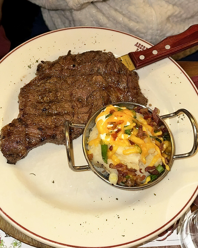 A perfectly charred steak with a loaded baked potato that's practically wearing jewelry. This plate doesn't just satisfy hunger&mdash;it fulfills a primal craving.