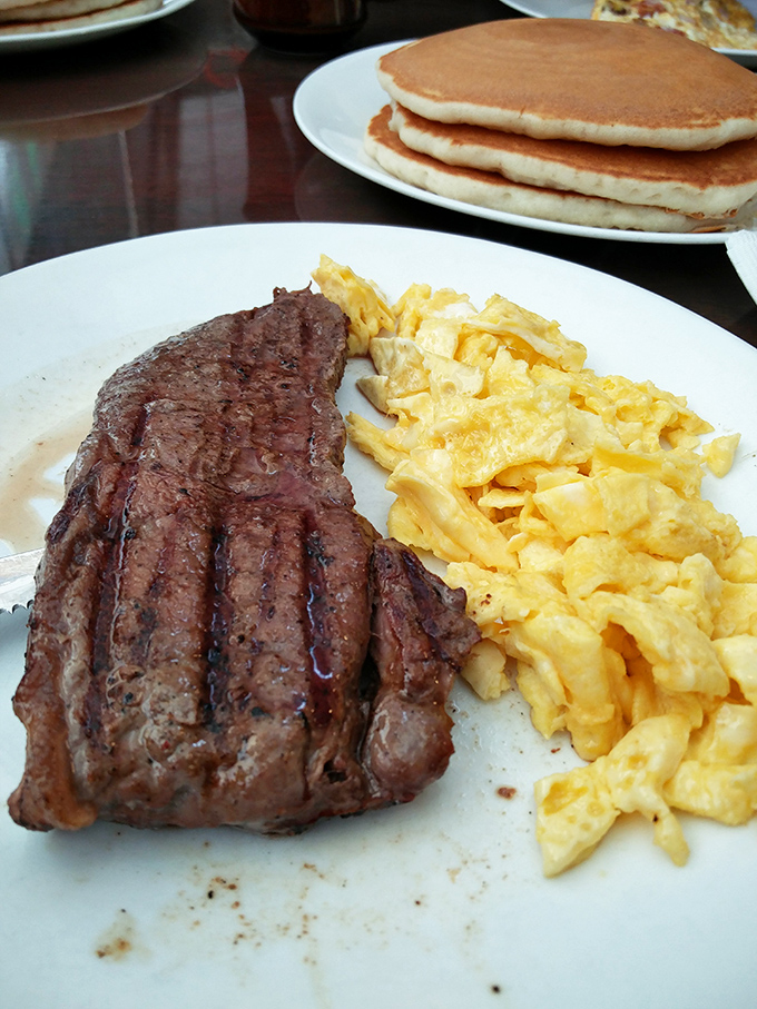 When breakfast needs to be serious business, the steak and eggs combo steps up with protein-packed authority.