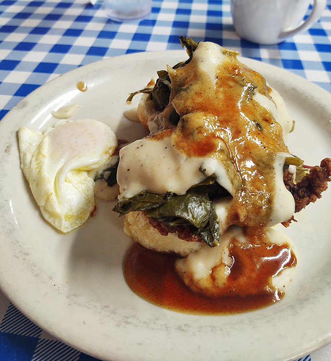 Southern ingenuity on a plate&mdash;collard greens, melted cheese, and gravy creating a breakfast symphony that Mozart would envy.