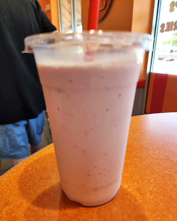 This strawberry milkshake isn't just thick&mdash;it's contemplating a career change to become soft-serve. Straw strength will be tested.