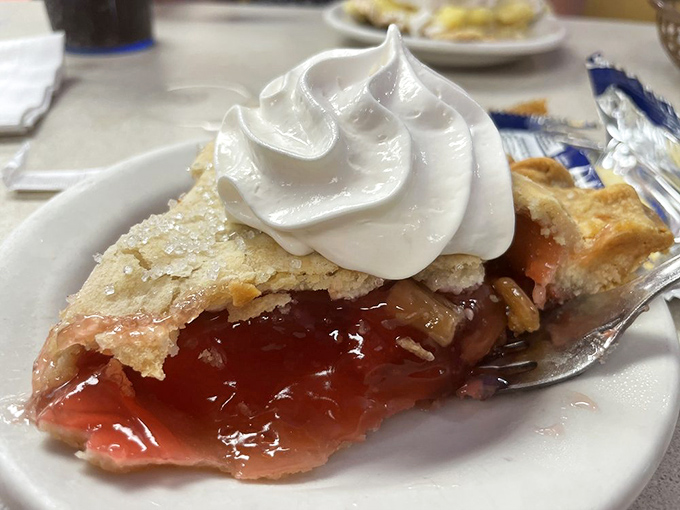 Strawberry pie with a cloud of whipped cream &ndash; the kind of dessert that makes you consider starting with the last course first.