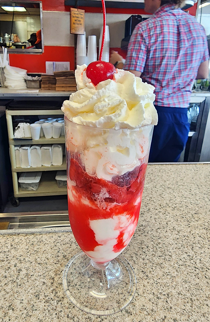 The strawberry sundae stands tall and proud like a dessert skyscraper&mdash;layers of sweet architecture that makes spoons weak at the handle.