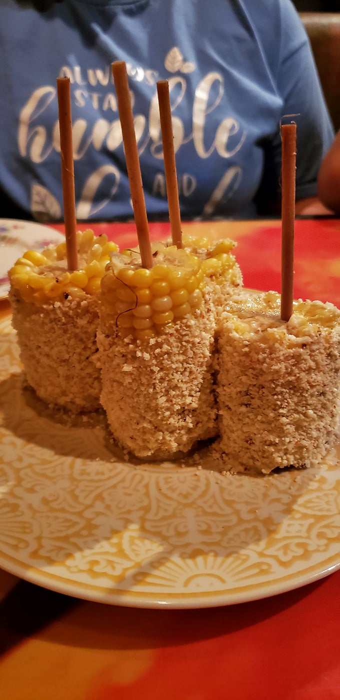 Street corn elevated to art form - messy, magnificent, and absolutely worth the napkins.