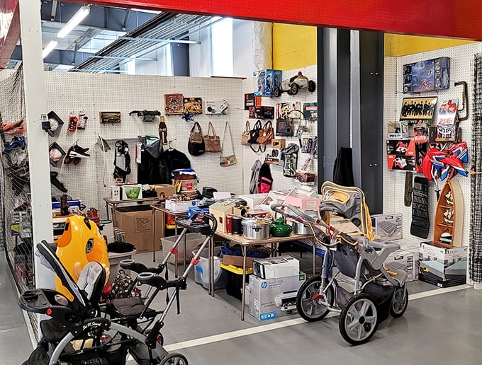 The stroller graveyard meets vintage handbag heaven. One booth's jumble of life stages where baby transport meets fashion statements of decades past.
