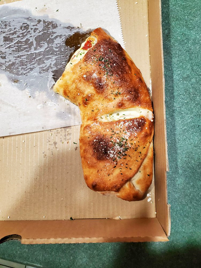 The stromboli: where bread, cheese, and fillings unite in a golden-brown package that makes you wonder why you ever settled for a sandwich.