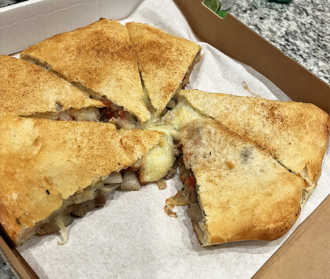 Deep-dish dreams come true in this towering testament to Chicago-style pizza engineering and pure indulgence.