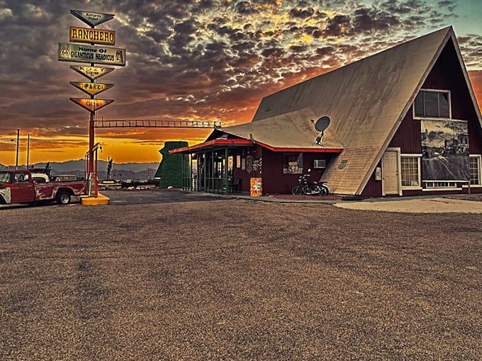 Desert sunsets transform the visitor center into a painting-worthy scene, with golden light bathing the quirky landmark in cinematic glory.