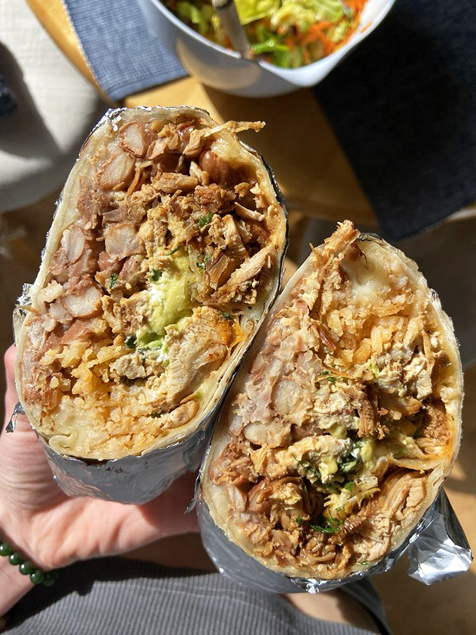 The super chicken burrito, split to reveal its inner glory &ndash; like finding out your mild-mannered friend is secretly a superhero.