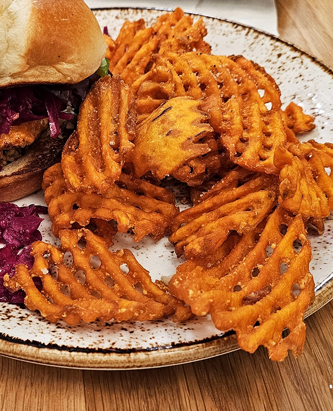 Sweet potato waffle fries that crunch like autumn leaves but taste like summer sunshine. The perfect sidekick to any sandwich adventure.