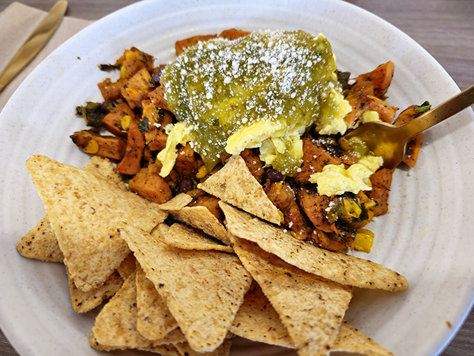 Sweet potato hash that makes you question why regular potatoes get all the glory. The tortilla chips aren't just garnish—they're essential scooping tools.