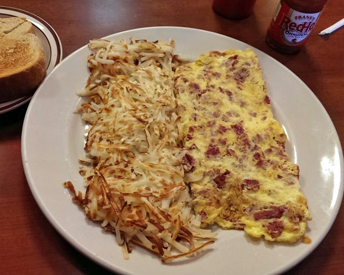 An omelet that's seen things, done things, and brought back souvenirs. Half your daily protein requirement in one glorious yellow package.