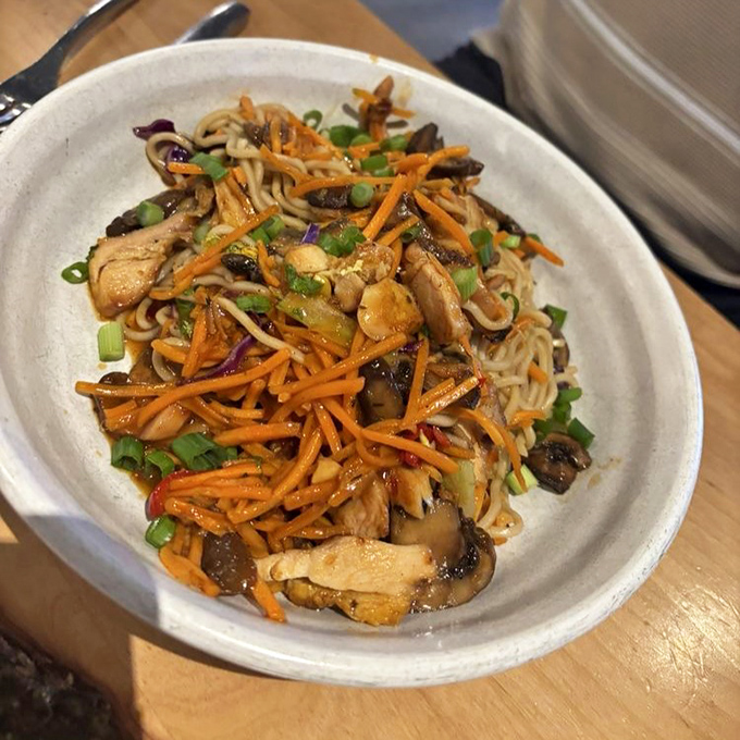 Noodles that don't just sit there looking pretty &ndash; they dance with chicken, mushrooms, and carrots in a choreography of comfort.