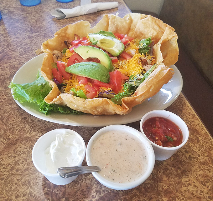 Not your average taco salad&mdash;this edible bowl cradles fresh ingredients with the tender care of a parent holding their firstborn. Three dipping sauces because choices matter.