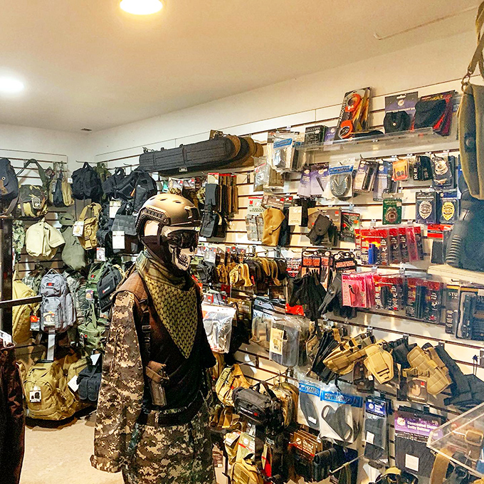 The mannequin isn't just dressed for success – it's prepared for tactical operations, wilderness survival, and possibly an impromptu appearance in an action movie.