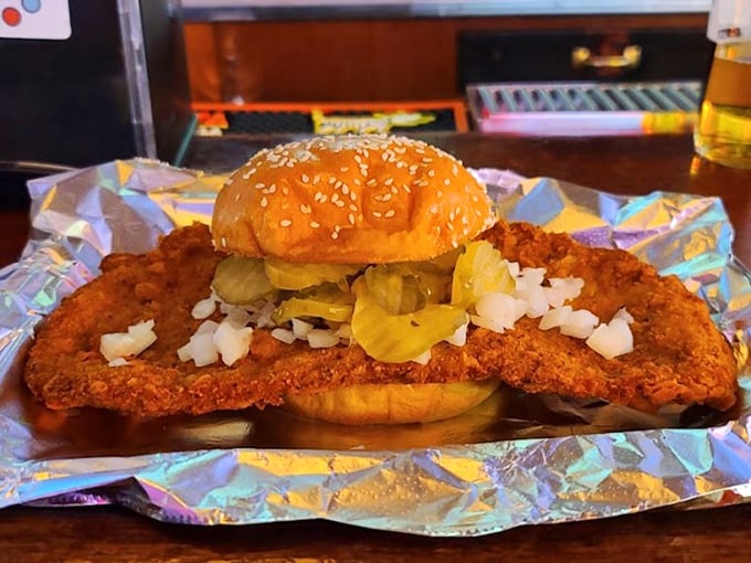 The tenderloin-to-bun ratio here is hilariously perfect&mdash;like wearing a king-sized comforter as a cape. Those pickles and onions aren't garnish; they're essential counterpoints.