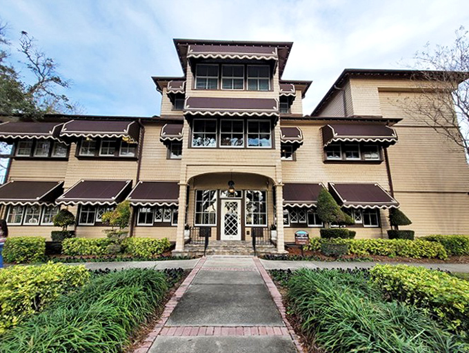 The Casements stands as elegant today as when Rockefeller wintered here. Those awnings have shaded some fascinating conversations through Florida's history.