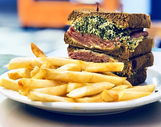 Stacked higher than my retirement dreams, this sandwich demonstrates why architecture matters in the culinary arts.