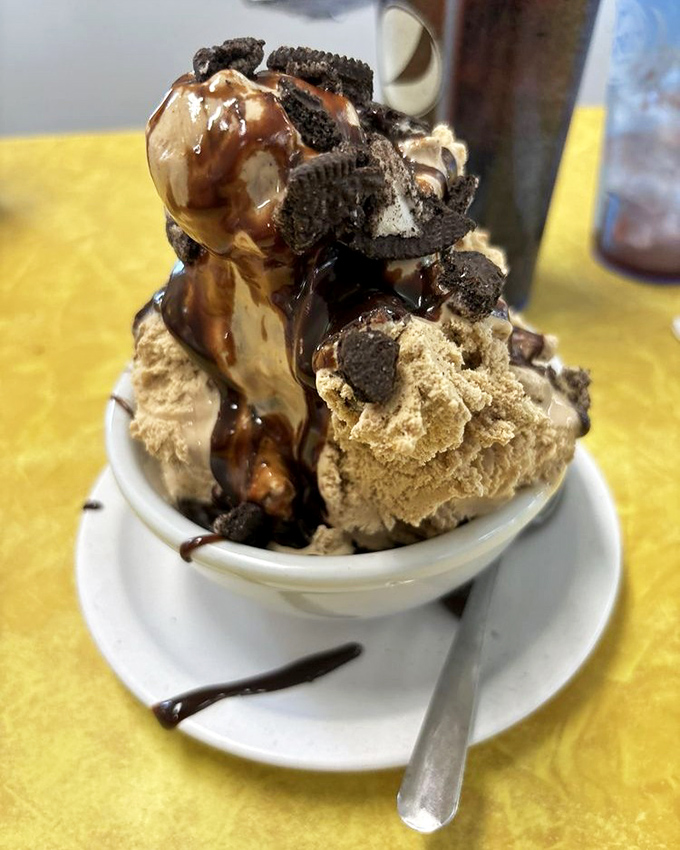 Chocolate ice cream adorned with cookie crumbles and hot fudge&mdash;like a black-tie affair where the dress code is "deliciously messy."